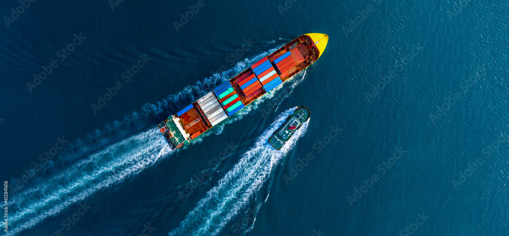 Container ship was dragged by tug boat to international cargo port for ...