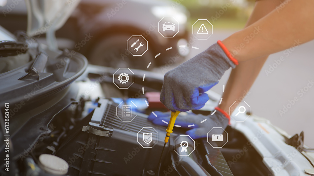 Car inspection and maintenance concept. Man checking level of engine ...