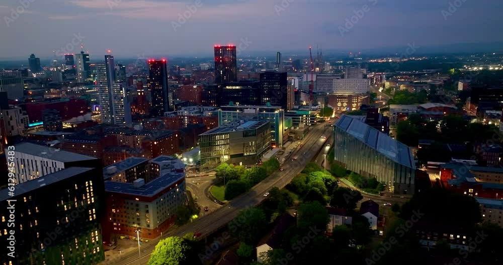 Manchester skyline aerial view during twilight filmed from Princes road ...