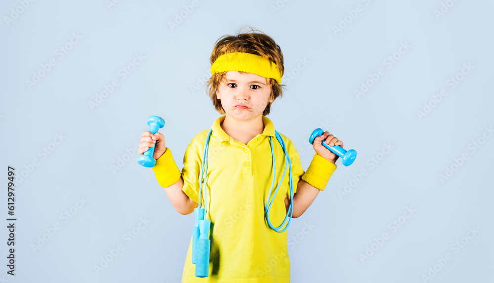 Childhood activity. Healthy lifestyle. Sporty boy with jumping rope and ...