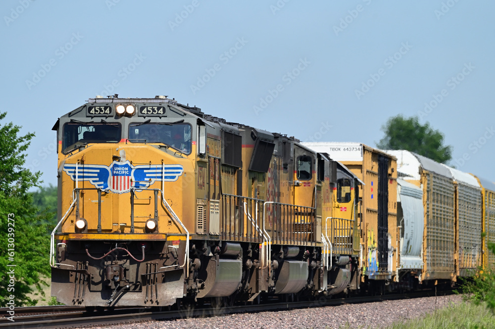 Locomotives lead an Union Pacific auto rack train through northeastern ...