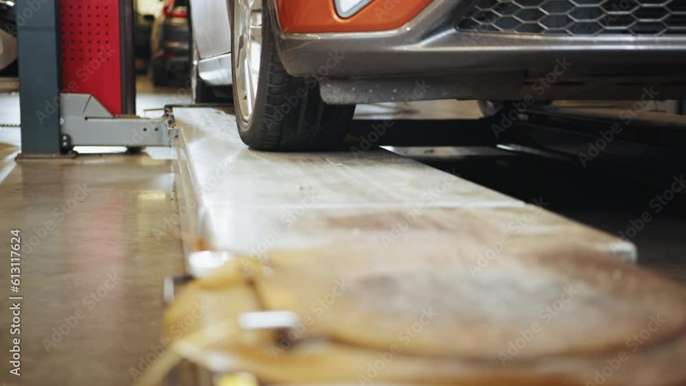 Close up view of service lift car. The car pulls into a modern service ...