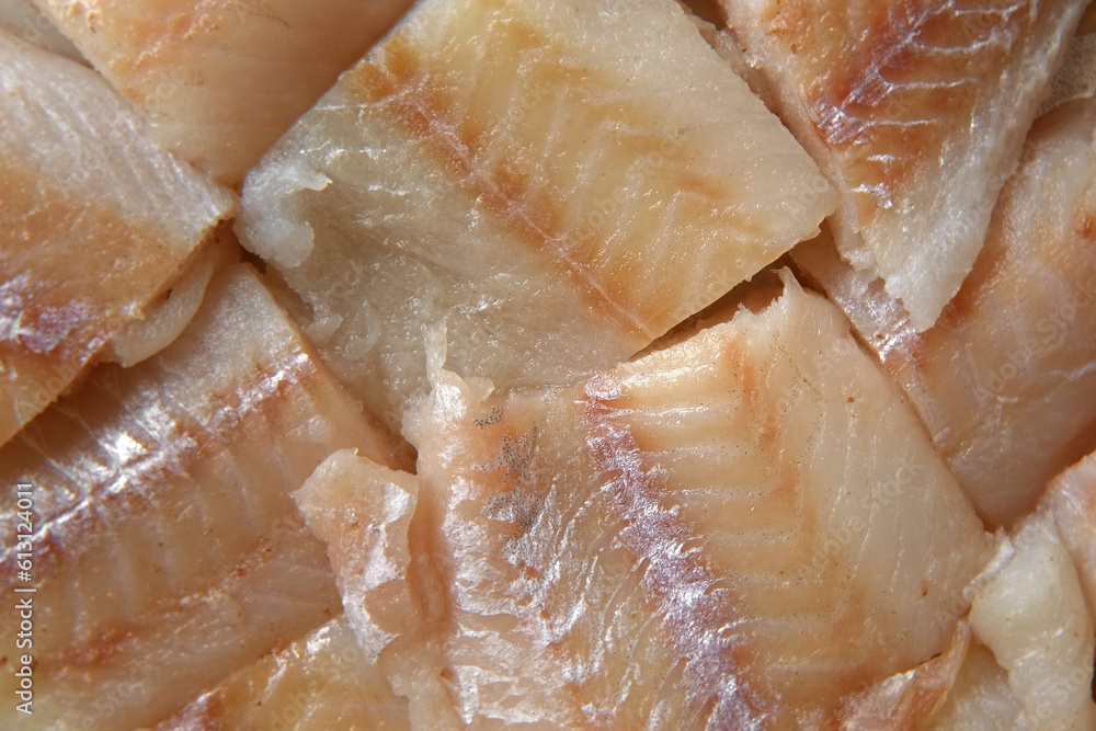 Raw fish fillet is spinning. Top view. Slices of fresh whitefish. Full ...