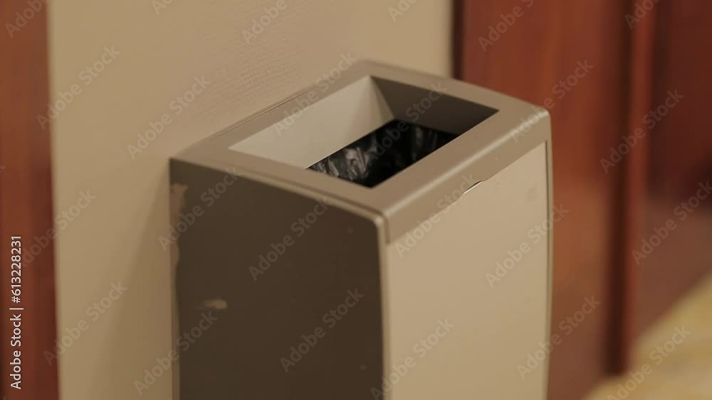 plastic trash bin in the interior. the garbage can inside interior. the ...