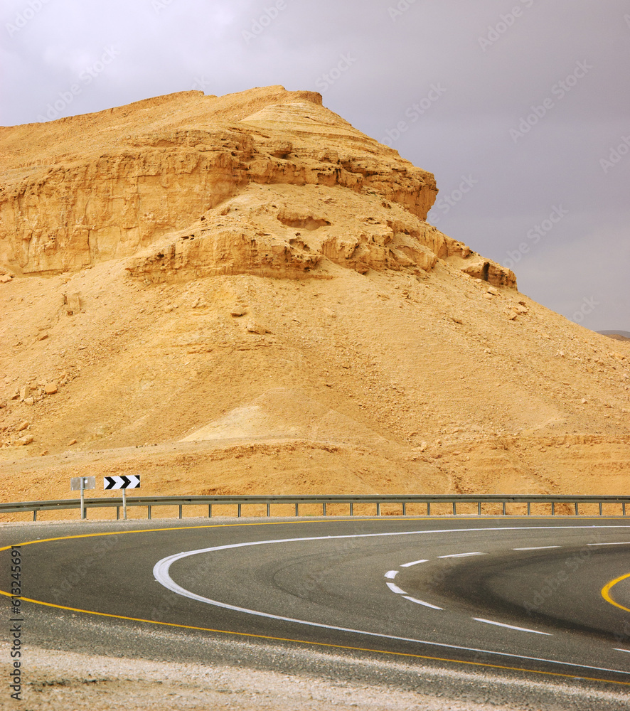 Road in the desert between Beersheba and Eilat. Israel. Dangerous curve ...