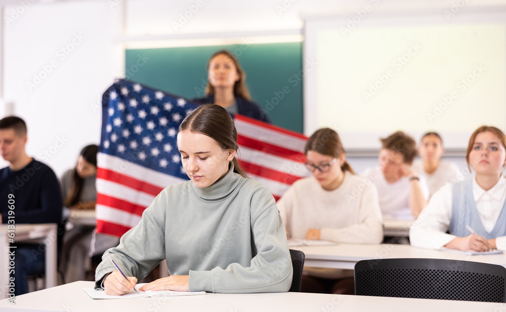Geography lesson in school class - teacher talks about United States of ...