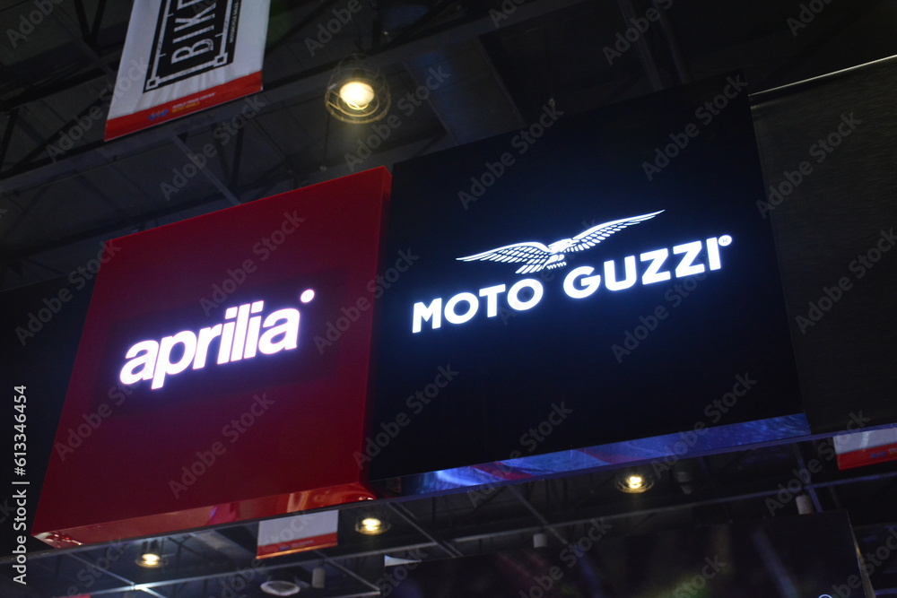 Aprilia and Moto guzzi booth signage at Inside racing bike festival in ...