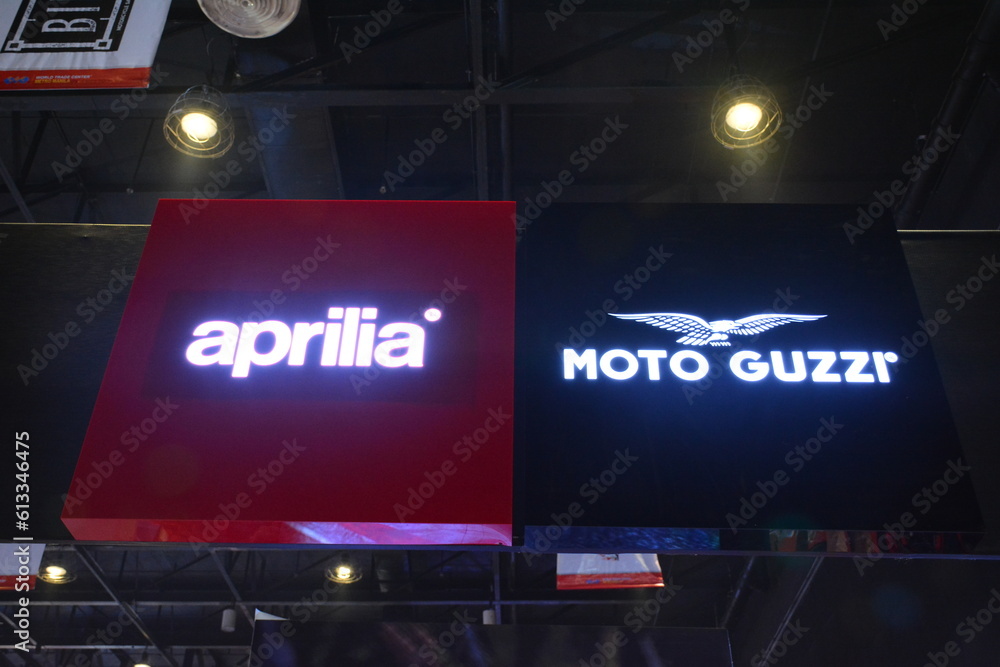 Aprilia and Moto guzzi booth signage at Inside racing bike festival in ...