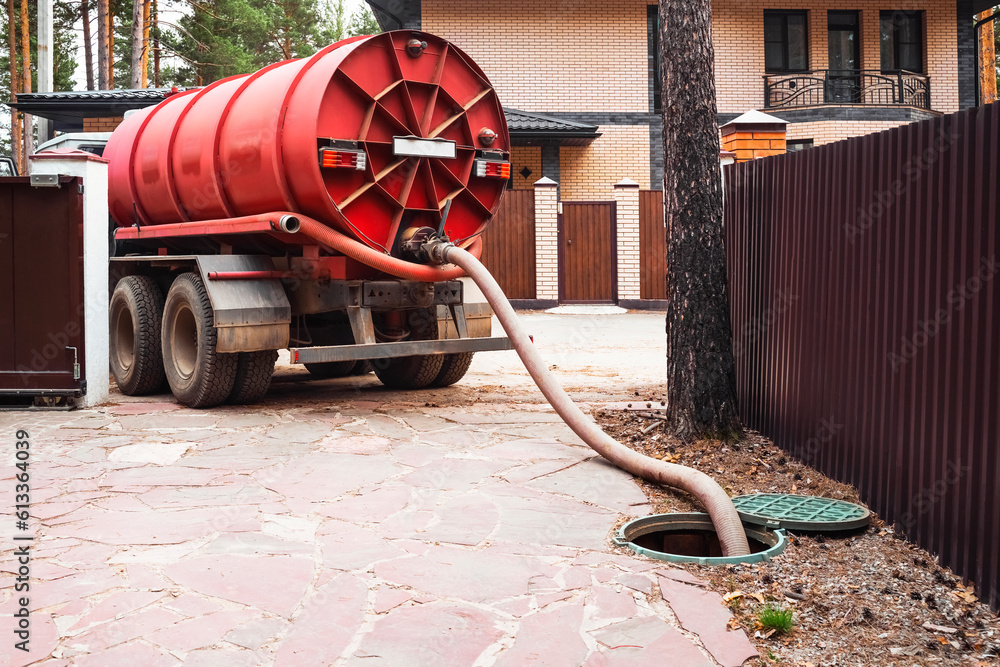 Sewage Tank truck. Sewer pumping machine. Septic truck. Pipe in the ...