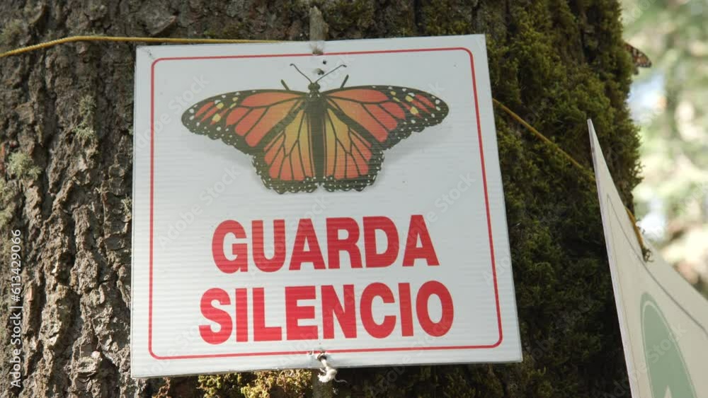 Be Quiet, Guarda Silencio sign in Spanish, the Monarch Butterfly ...