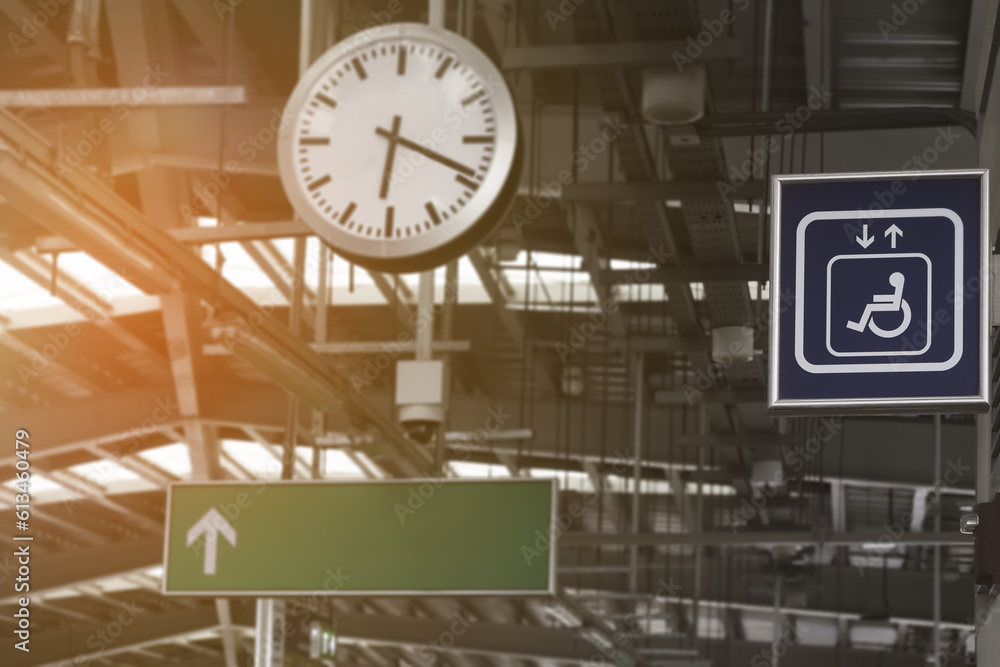 Focus to blue symbol of lift or elevator for disabled person or ...