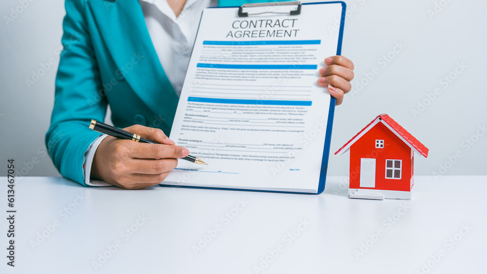 Realtor with contract, red house model, amenities, appraisal price ...