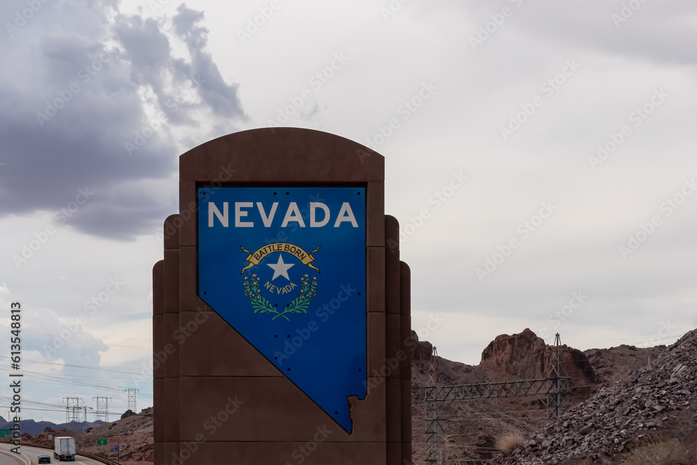 Sign at the Nevada Arizona state line at Hoover Dam in the Black Canyon ...
