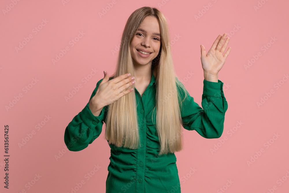 Come here, join us. Welcome. Young woman showing inviting gesture with ...