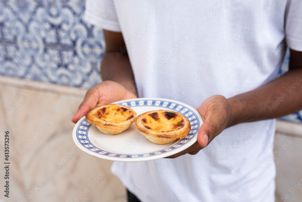 Plate with Pastel de Nata, Portugal's traditional sweet dessert, egg ...