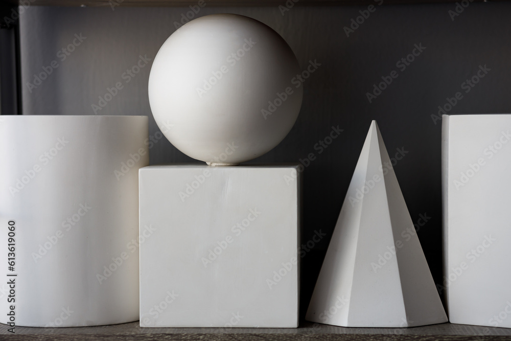 three-dimensional figures of different shapes on which a soft shadow ...