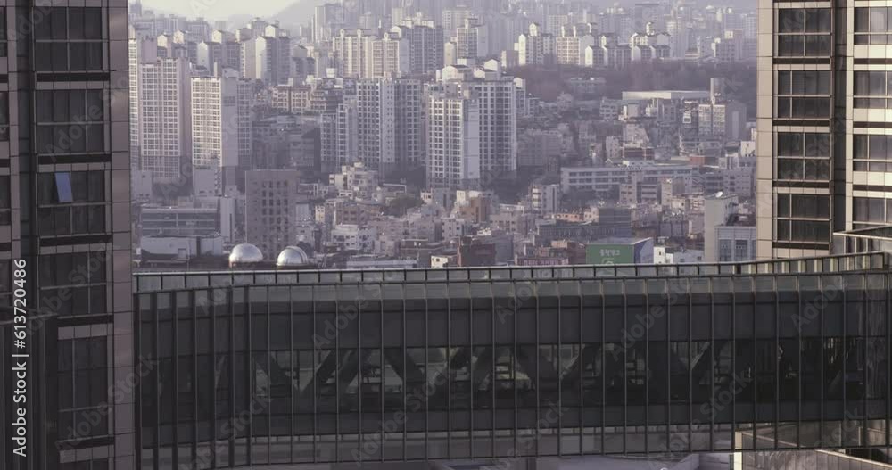 Seoul, Korea Office Worker Walks Through Skyscraper Skywalk Over Modern ...