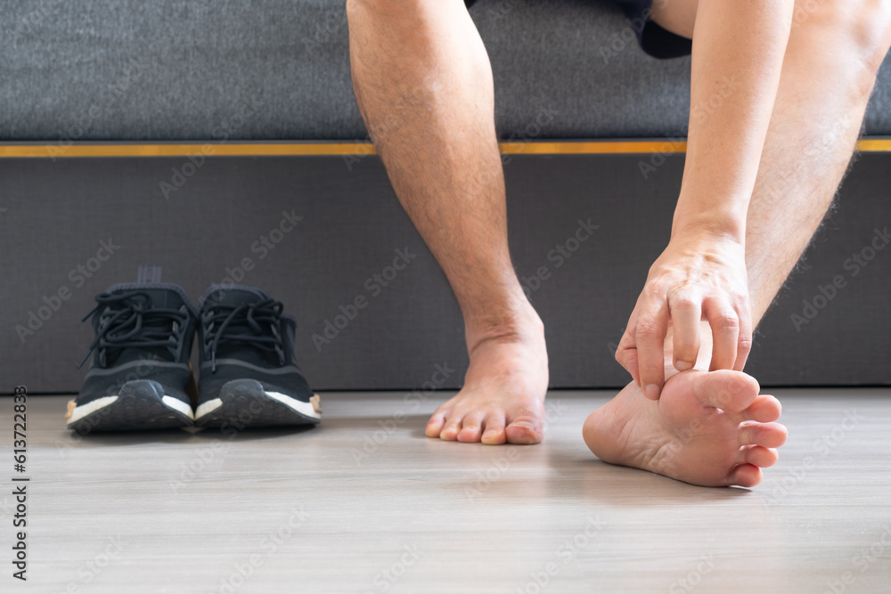Men wear canvas shoes, he scratches legs and feet with itchy skin ...