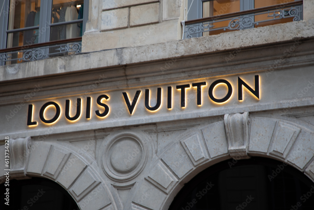 Louis Vuitton facade logo store sign boutique text shop Luxury brand ...