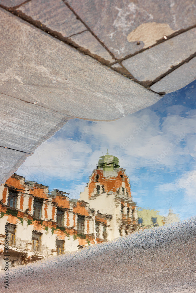 reflection of city mansion in the water. architecture and sights ...