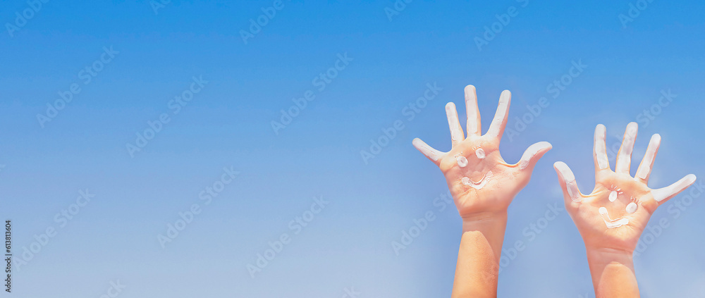 Banner of positive symbol drawing by sunscreen (sun cream, suntan ...