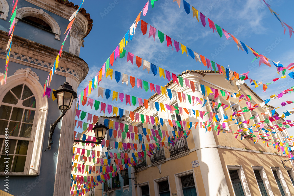 Pelourinho houses decorated with colorful flags on the facade for the ...
