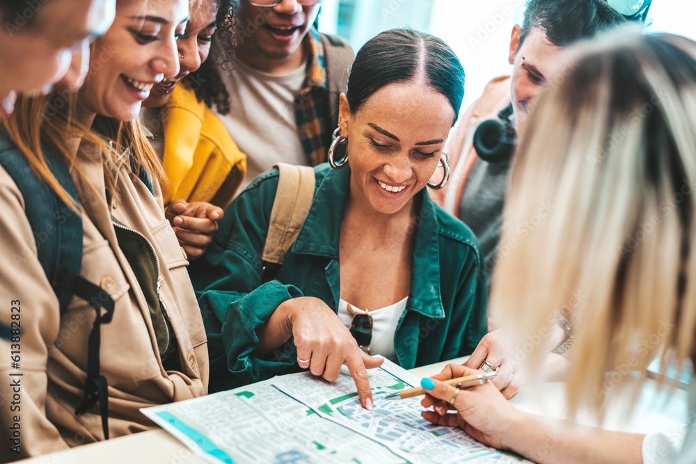 Group of young people doing check-in of youth hostel guest house ...