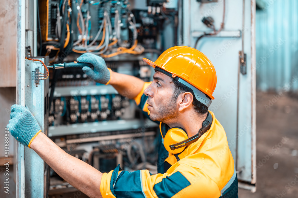 Electrical technician tests wiring, polarity, grounding, voltages and ...