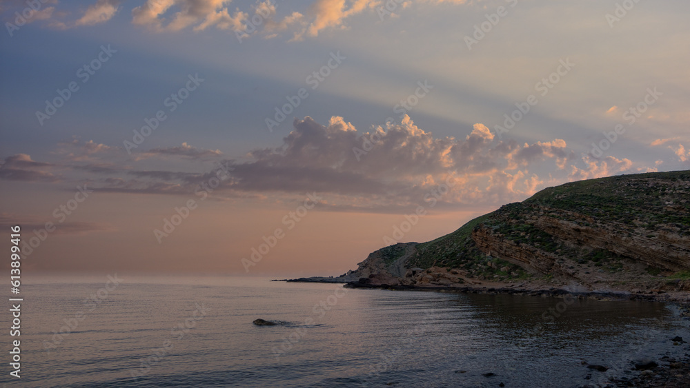 Yildiz Koy beach at sunset, located in Gokceada, with the Greek name of ...