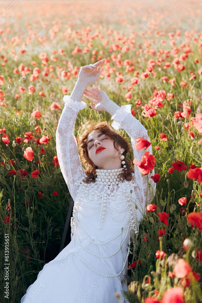 A beautiful girl in a vintage white dress, as a model, at a fashion ...