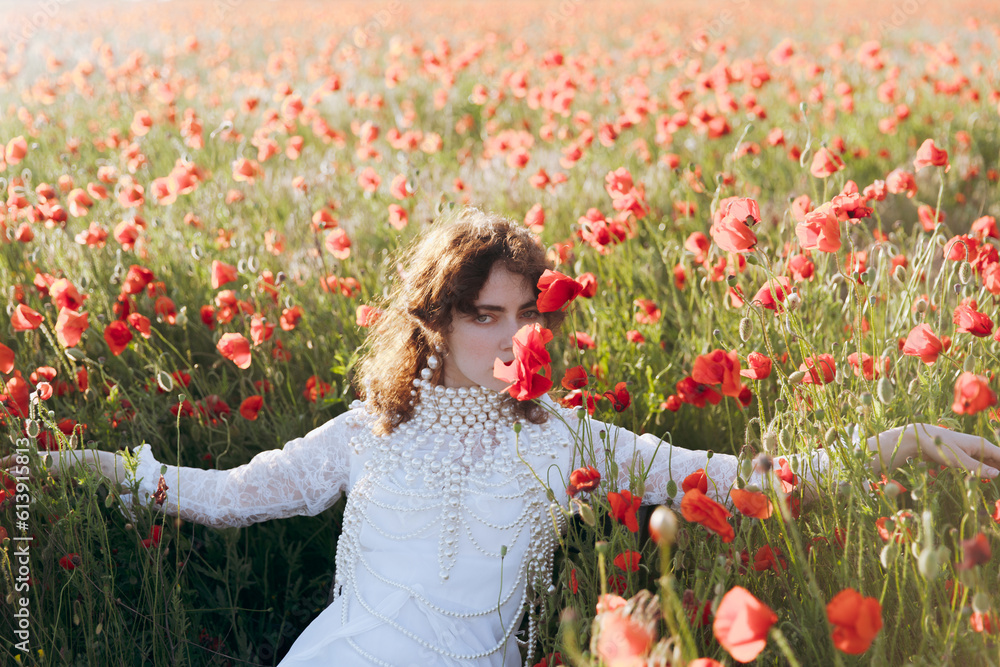A beautiful girl in a vintage white dress, as a model, at a fashion ...