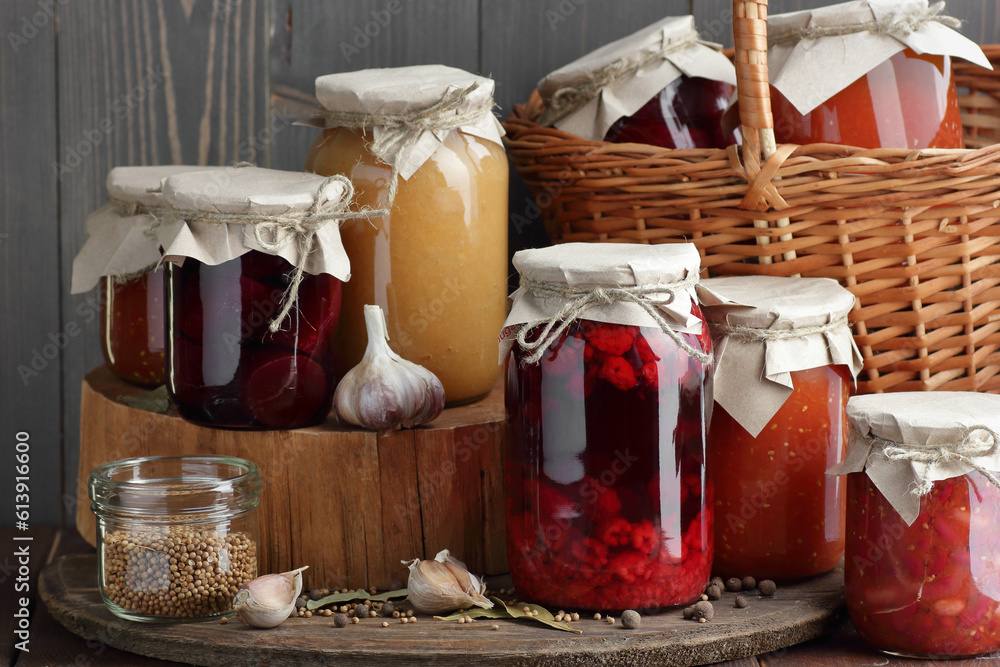 Homemade canned vegetable food: conserved beetroot, tomato paste ...