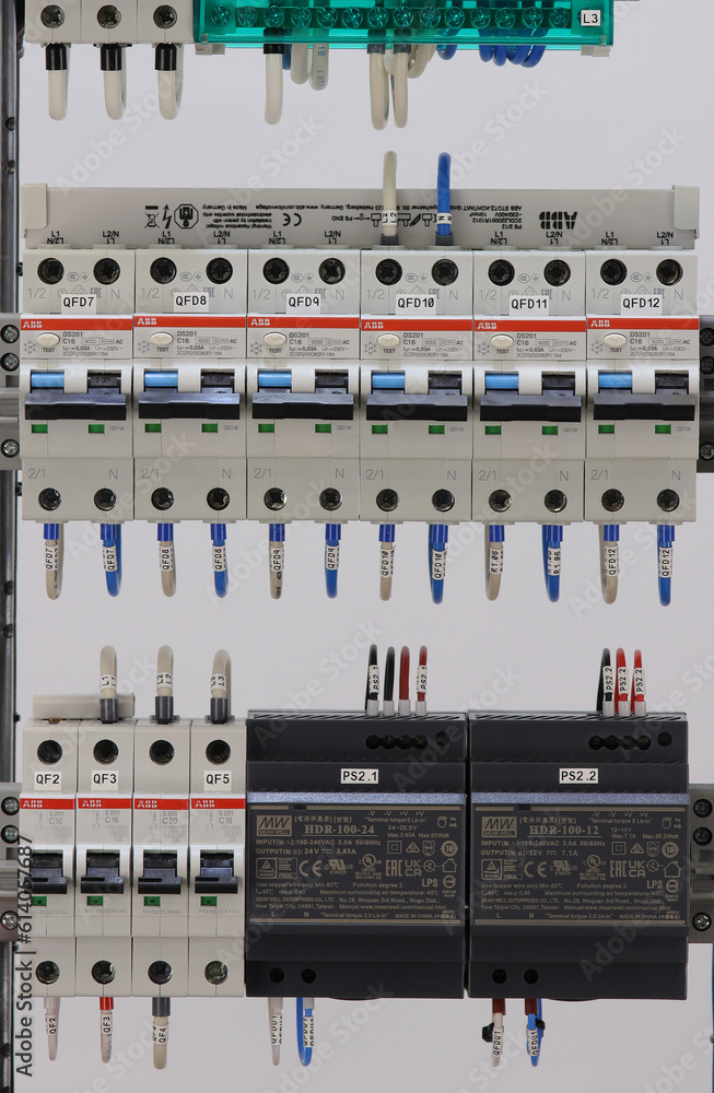 Foto de Electric circuit breakers installed on a din rail in an ...