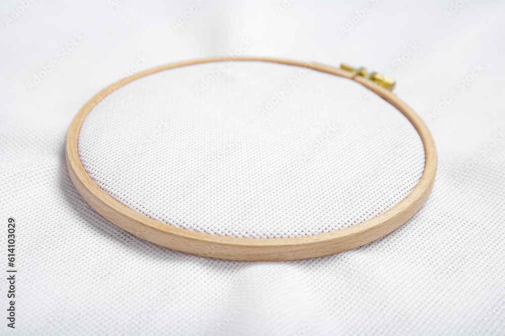Wooden embroidery hoop with canvas as background Stock Photo | Adobe Stock