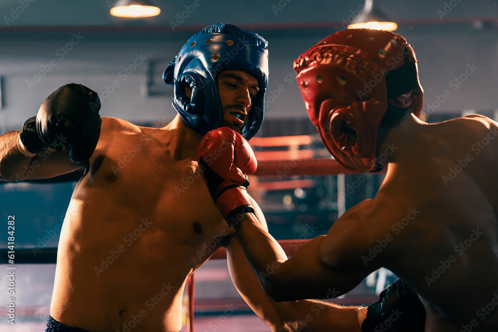 Two athletic and muscular body boxers with safety helmet or boxing head ...