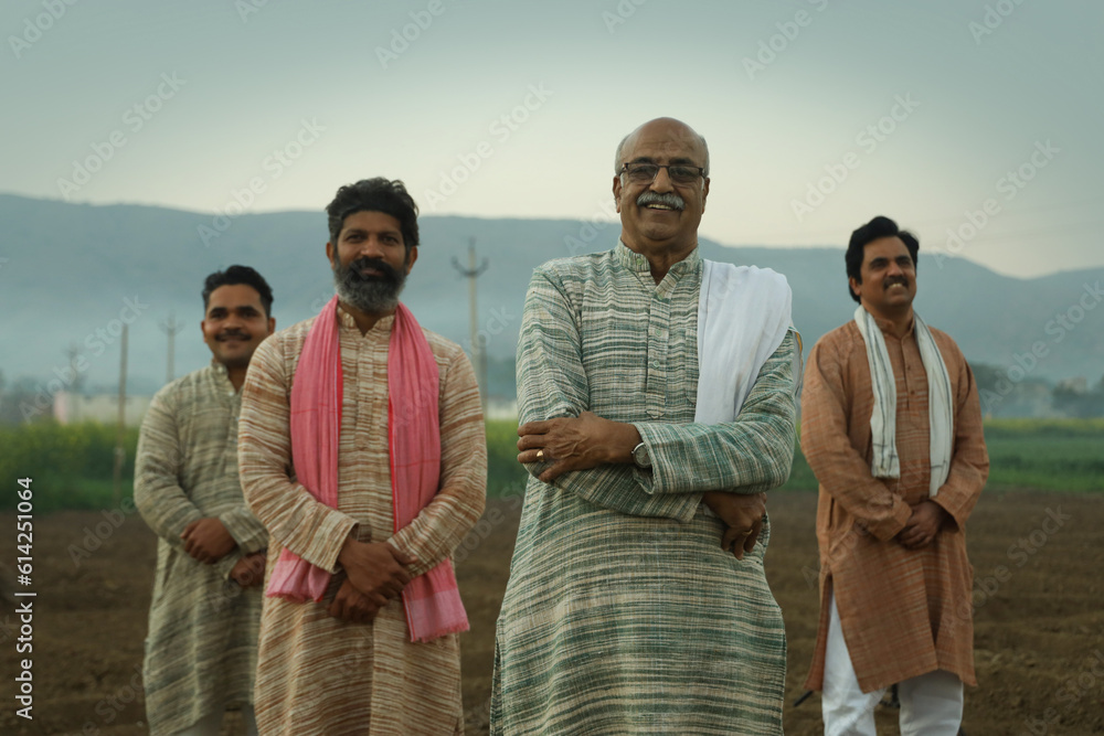 Happy rural Indian group of farmers dramatic silhouette shot standing ...