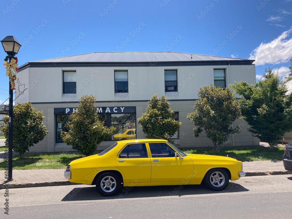 Yellow vintage Australian classic Holden Kingswood sedan car parked on ...