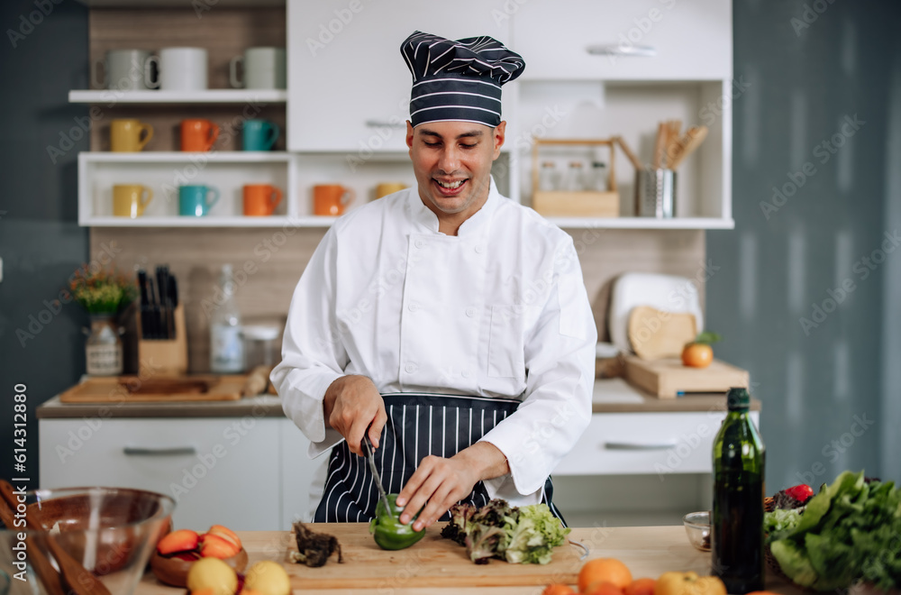 The professional master chef prepares a bowl of various types of fruit ...