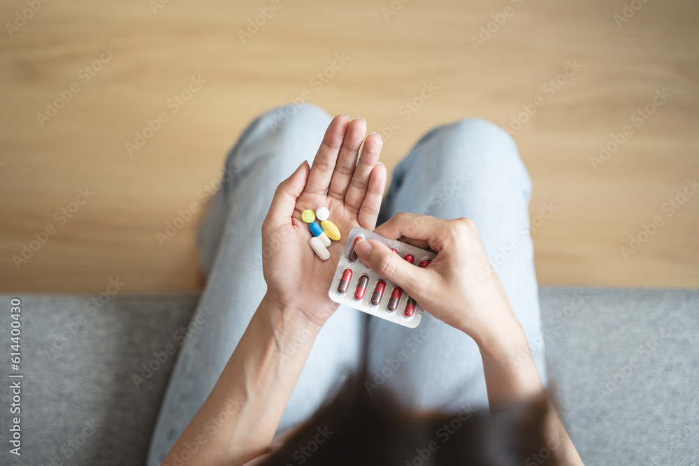 Healthcare Harmony: Close-Up Hands Holding Medication and Water Glass ...