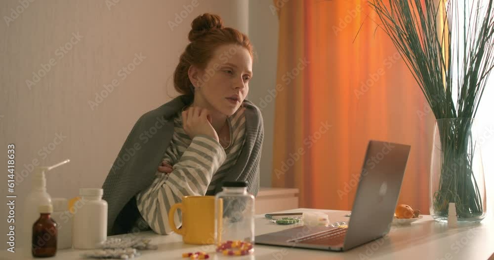 sad unhealthy sick red-haired woman with closed eyes measuring ...