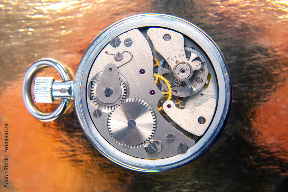 mechanical analog stopwatch on a colored background. Time part ...
