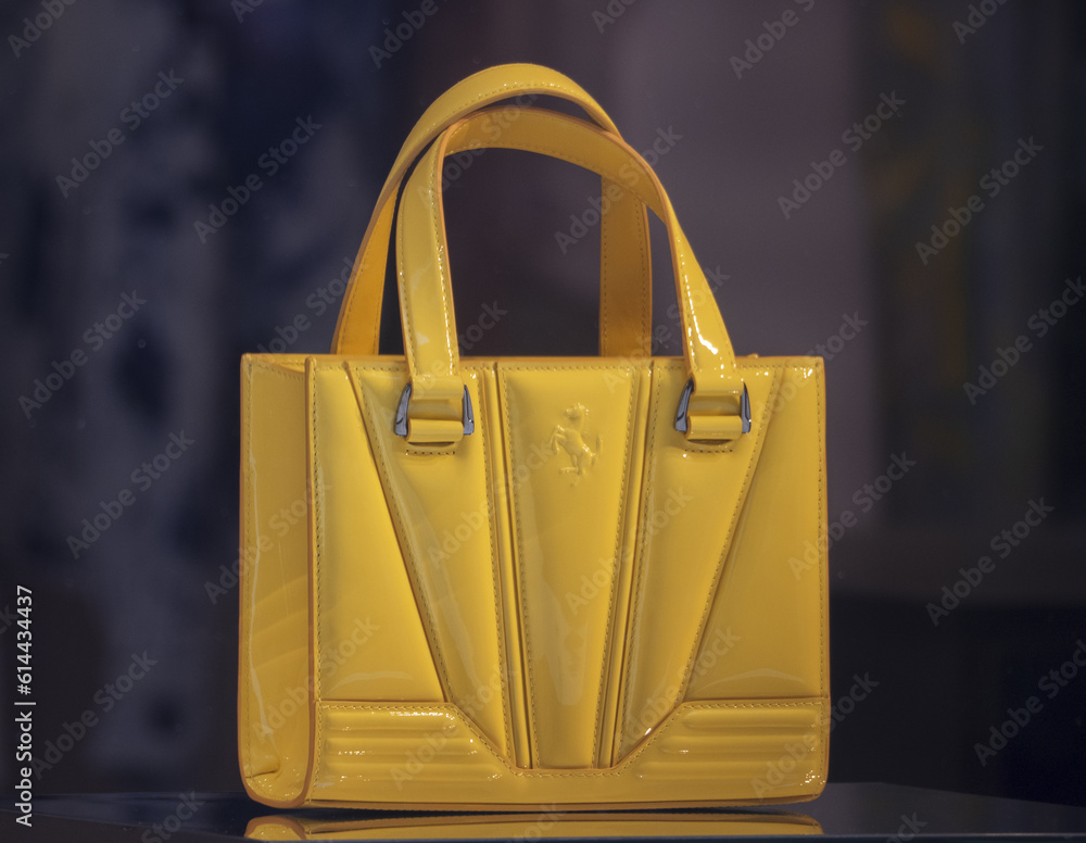 Yellow leather mini tote bag with double handles and prancing horse ...