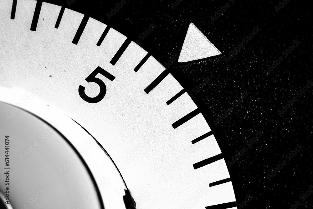 monochrome close-up of an old analog laboratory timer set to six Stock ...