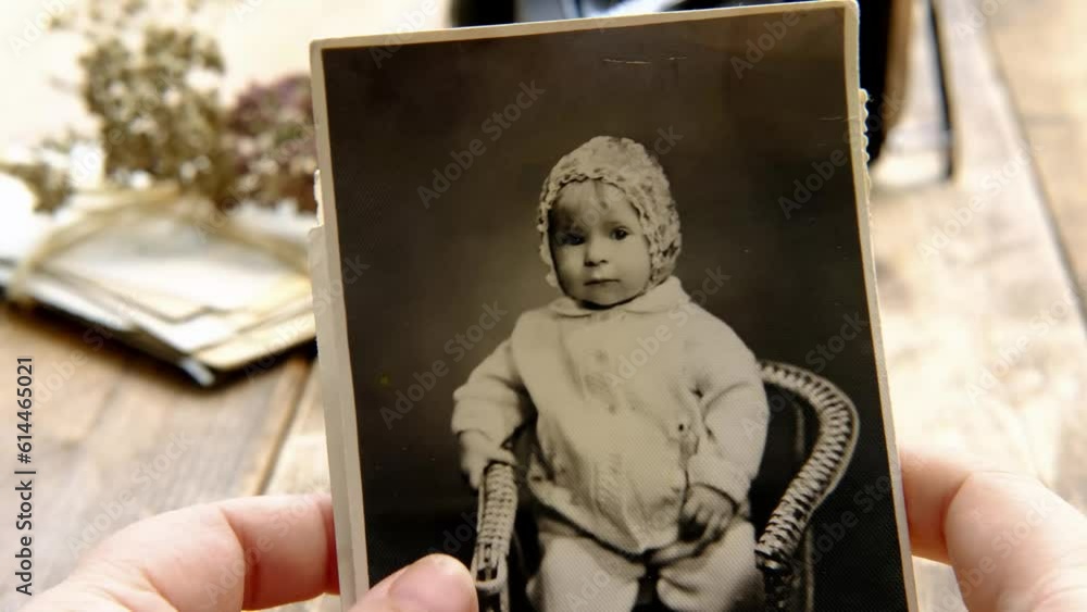 female hand hold old family photos, stack of old family vintage ...