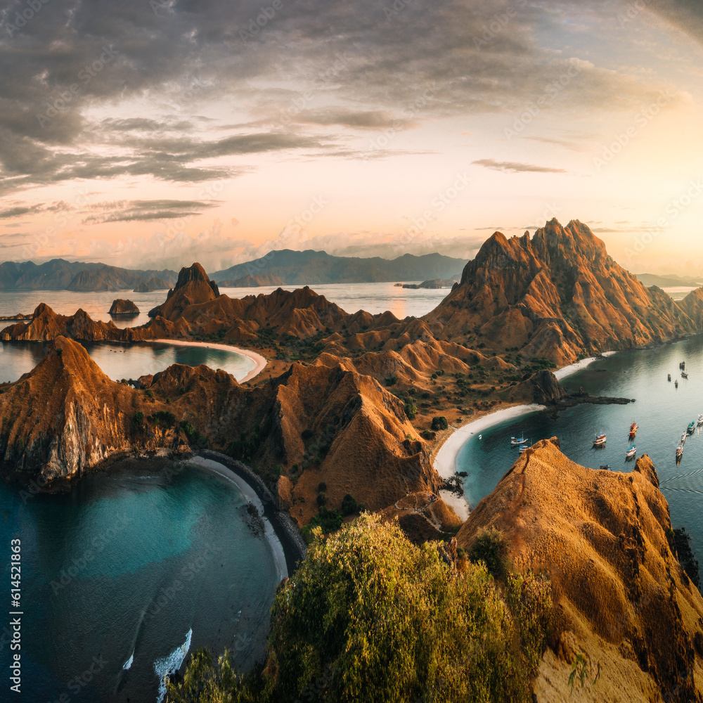 Panoramic warm view at top of Padar Island in sunrise late morning from ...