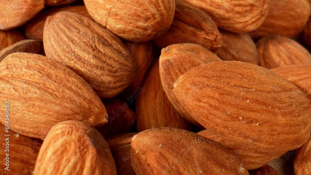 Highlighting the overall shape and size of the almond kernels. They are ...
