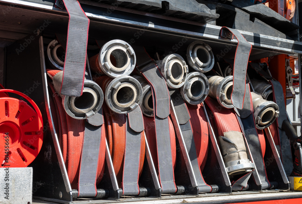 Fire engine equipment from the inside - fire hose hoses ready for use ...