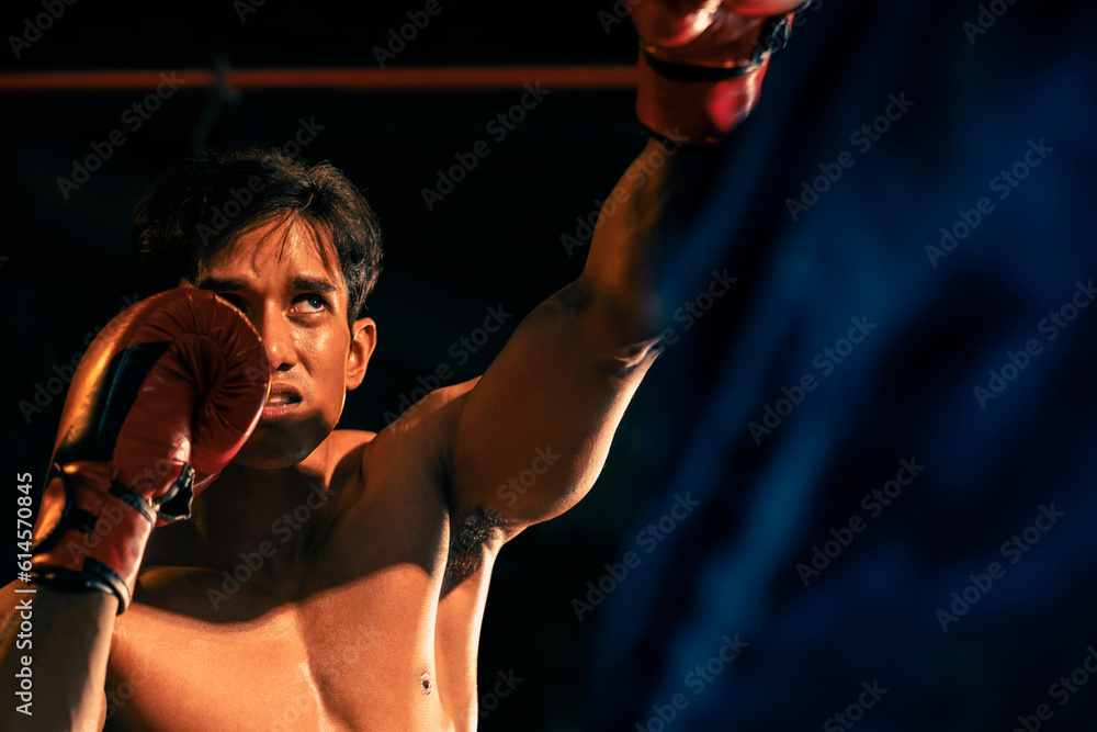 Foto de Asian and Caucasian Muay Thai boxer unleash their power in ...