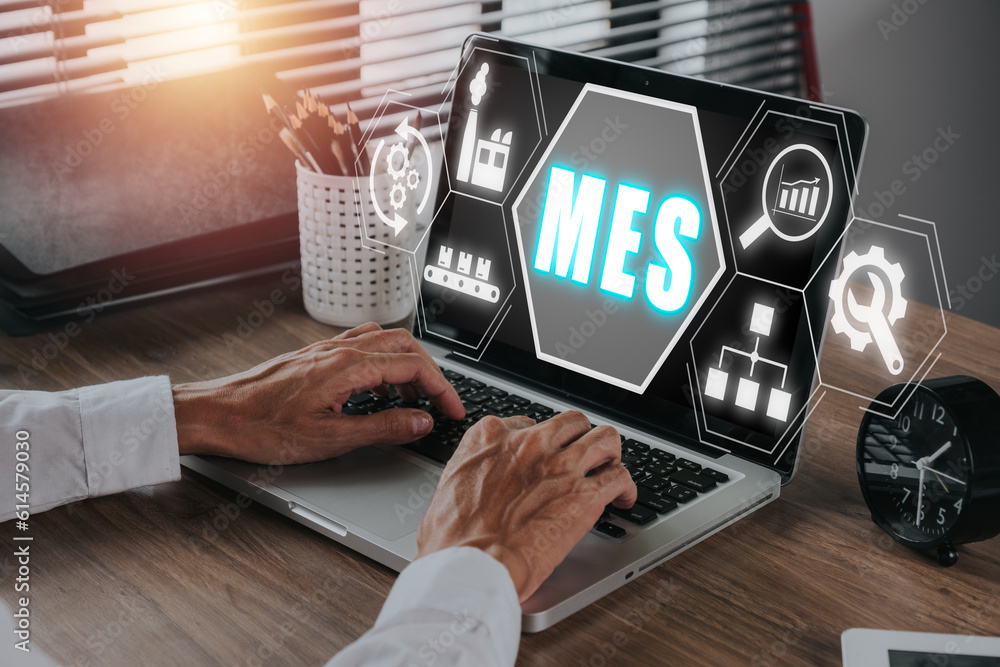 MES, Manufacturing Execution System concept, Businessman working on ... MES, Manufacturing Execution System concept, Businessman working on ...