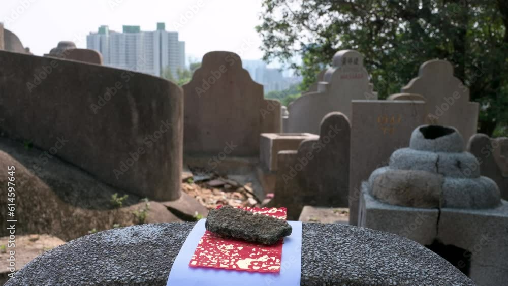 Video Stock An offering lays on top of a tombstone at the Diamond Hill ...